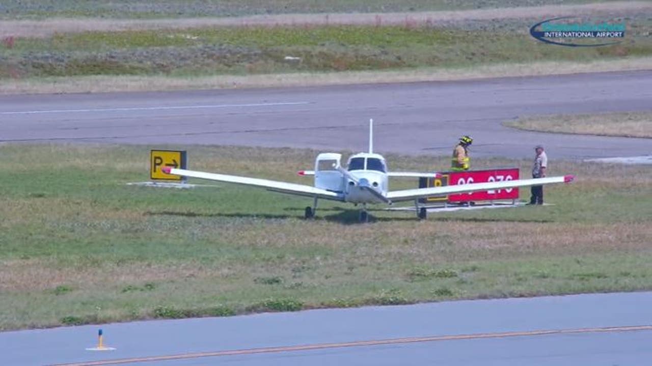 Small plane slides off runway at Orlando Sanford International Airport ...