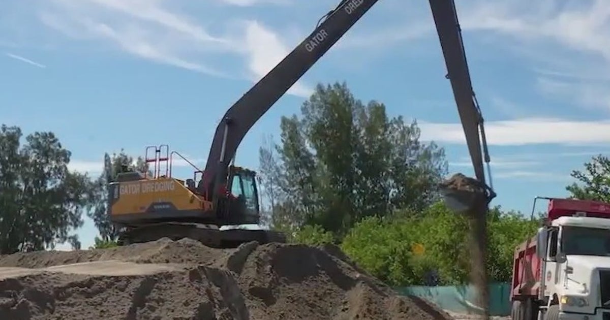 Brevard neighbors pushing back on muck removal behind homes as county ...