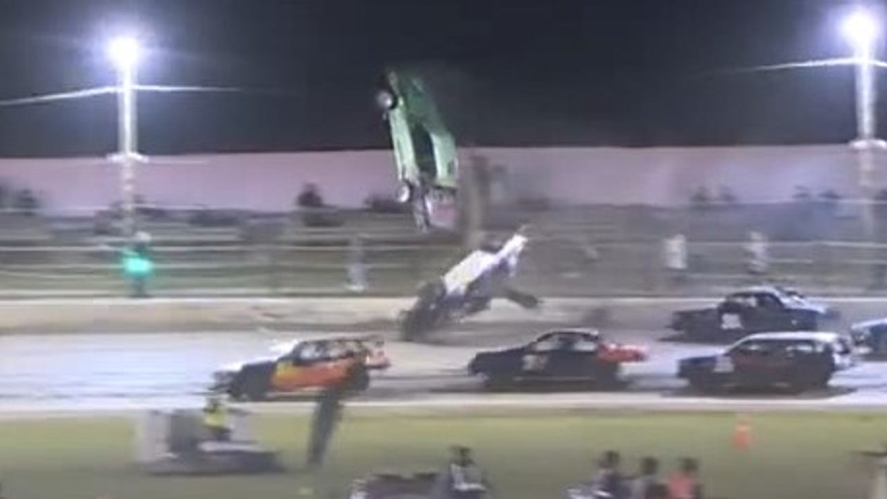 Spectators dodge 'freak accident' as race car flies over safety fence ...
