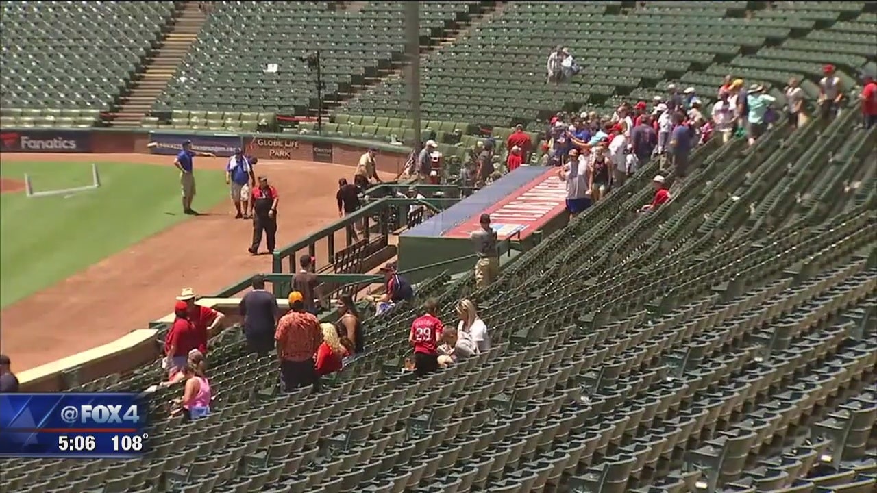 Small crowd of baseball fans brave raging temperatures in Arlington ...