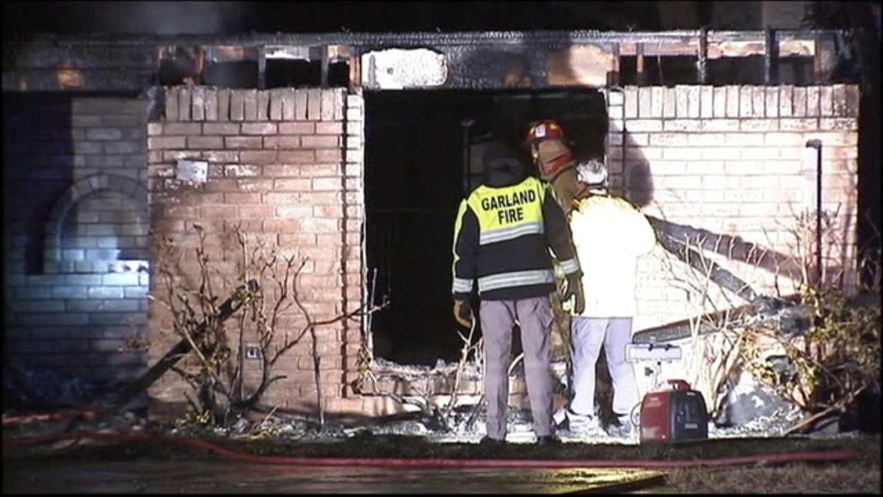 Firefighters find burned body inside Garland home