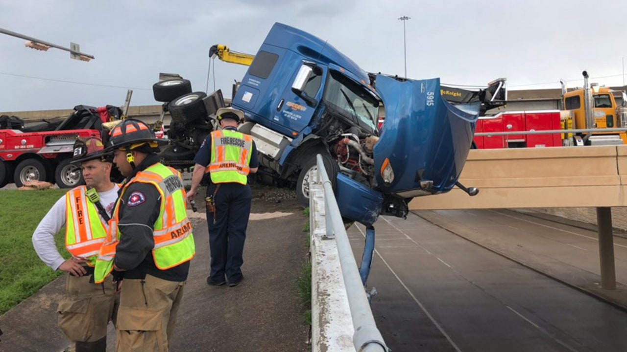 Big rig crashes in Arlington, cab dangles on edge of overpass | FOX 4 ...