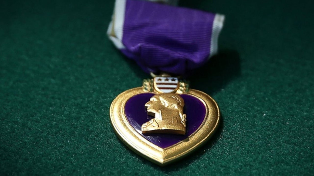 'Still one of us': 92-year-old gets Purple Heart from WWII