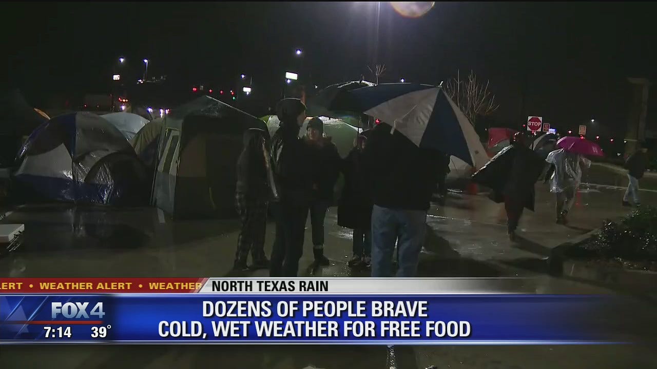 Chick-fil-A fans brave the rain and cold for free food