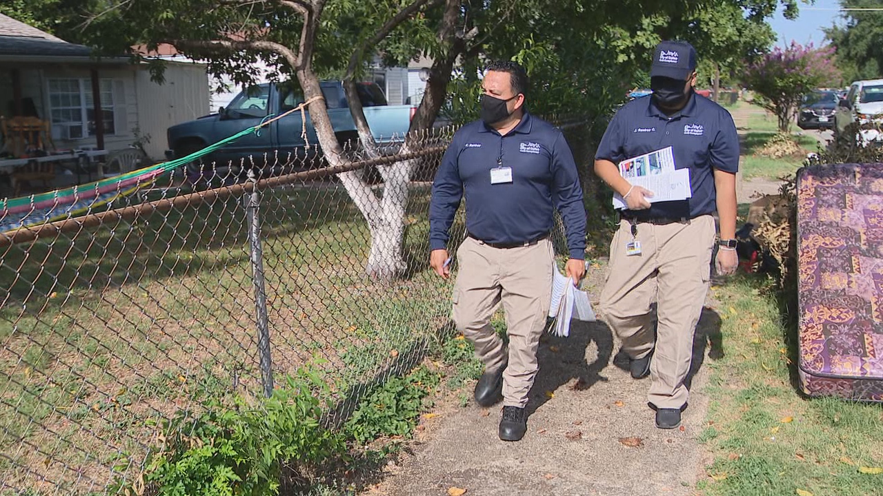 Dallas compliance code officers educate people in the zip code with the ...