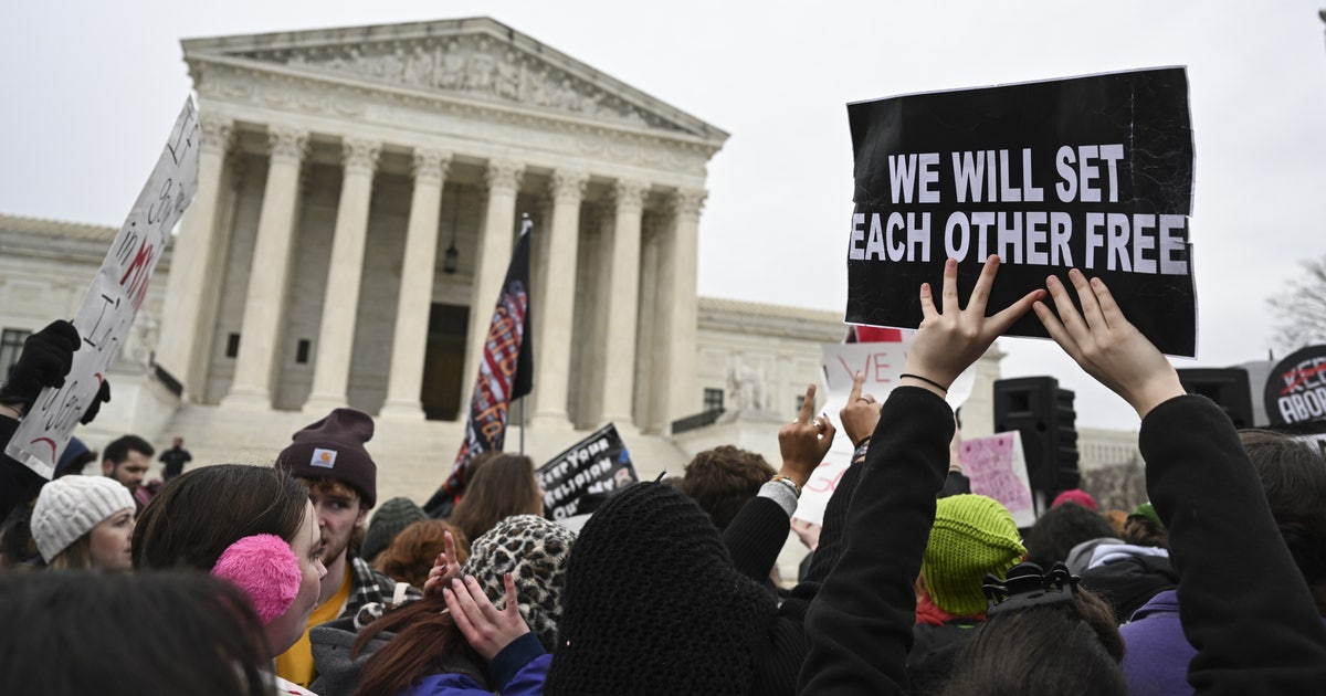 'We won't go back': Abortion rights activists rally 50 years after Roe ...