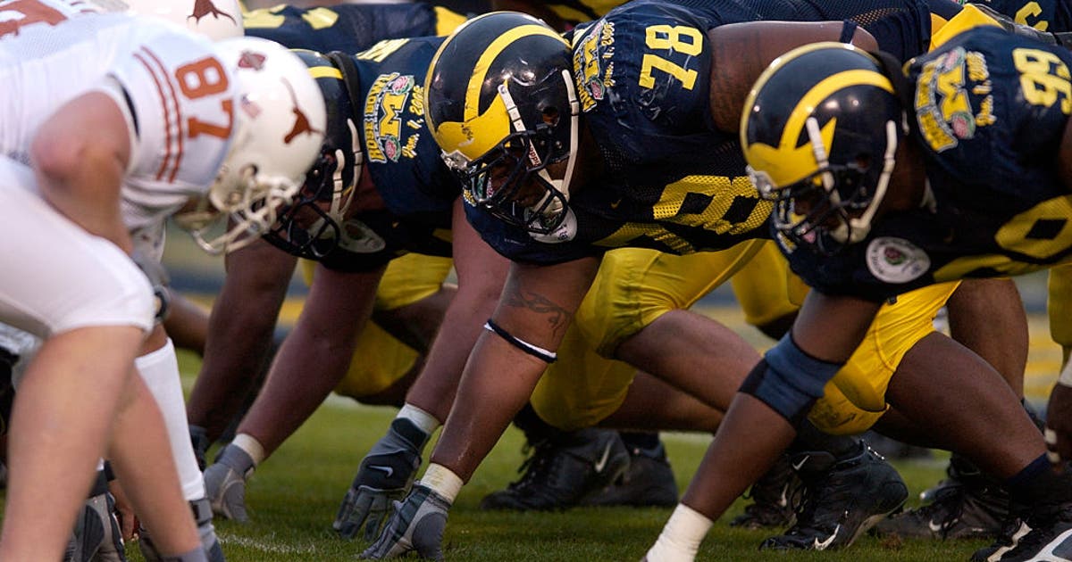 Texas and defending national champ Michigan clash in rare meeting of ...