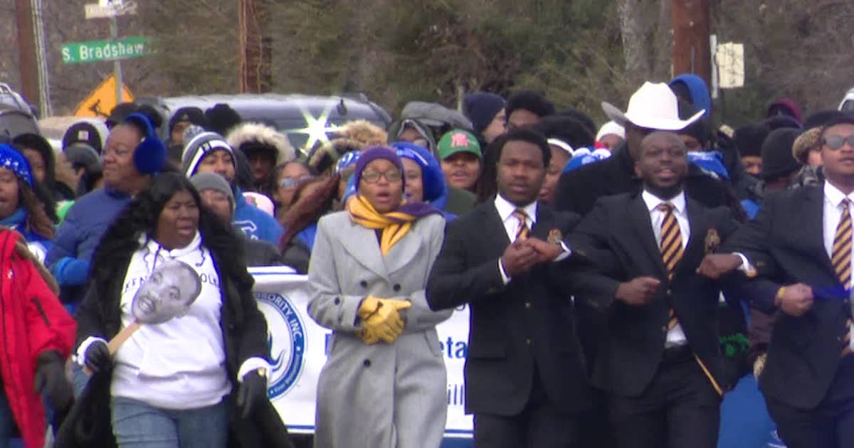 Local MLK Day parades postponed, people bundle up for Denton march ...