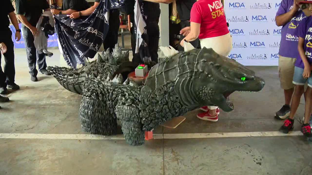 Dallas child receives Godzilla-themed wheelchair costume | FOX 4 Dallas ...