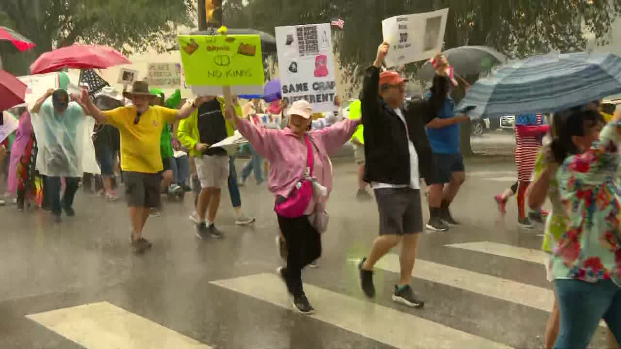 Thousands attend 'No Kings' protests Dallas-Fort Worth despite rain ...