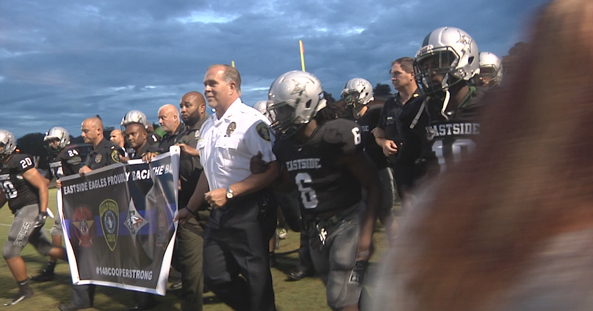 Officer Matt Cooper, law enforcement honored at football game | FOX 5 ...