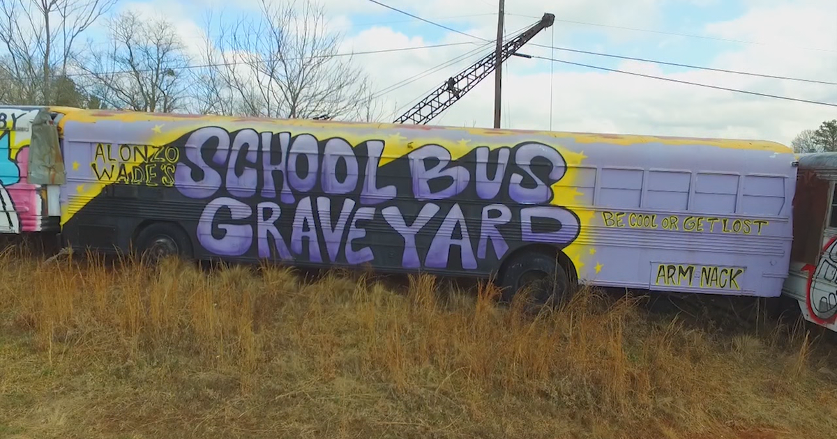 Artists use old buses as a canvas at the School Bus Graveyard | FOX 5 ...
