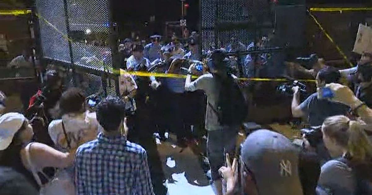 Protesters break through security fencing outside of the DNC | FOX 5 ...