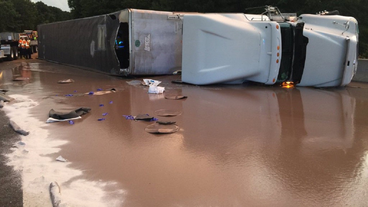 Officials clean up liquid plastic mess from busy interstate | FOX 5 Atlanta