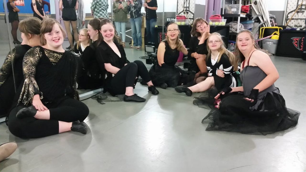 Dancers with Down syndrome 'frolic' in Halloween performance