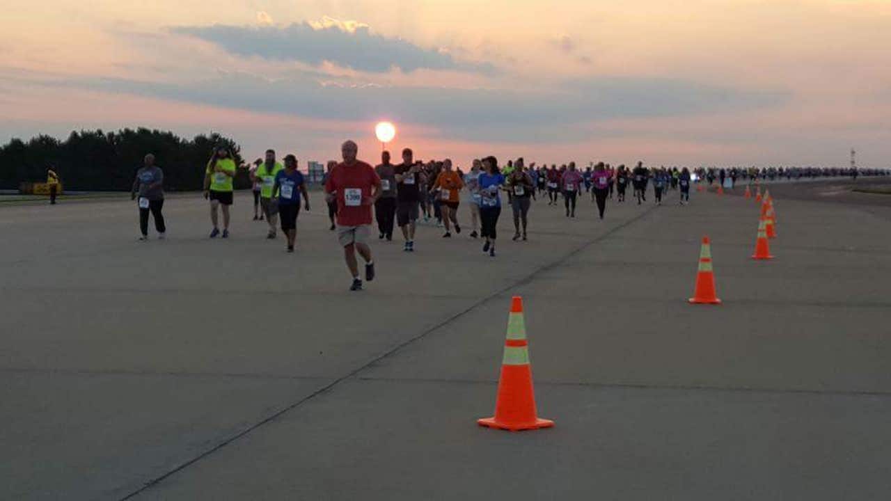 Runners, walkers race on runway for good cause | FOX 5 Atlanta