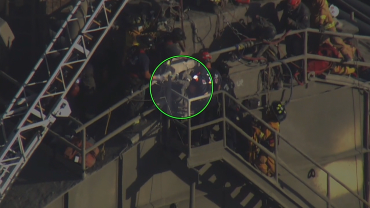 Firefighters rescue man stuck in cement mixer | FOX 5 Atlanta