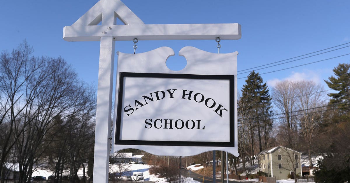 Sandy Hook father awarded $450K in defamation case against conspiracy ...