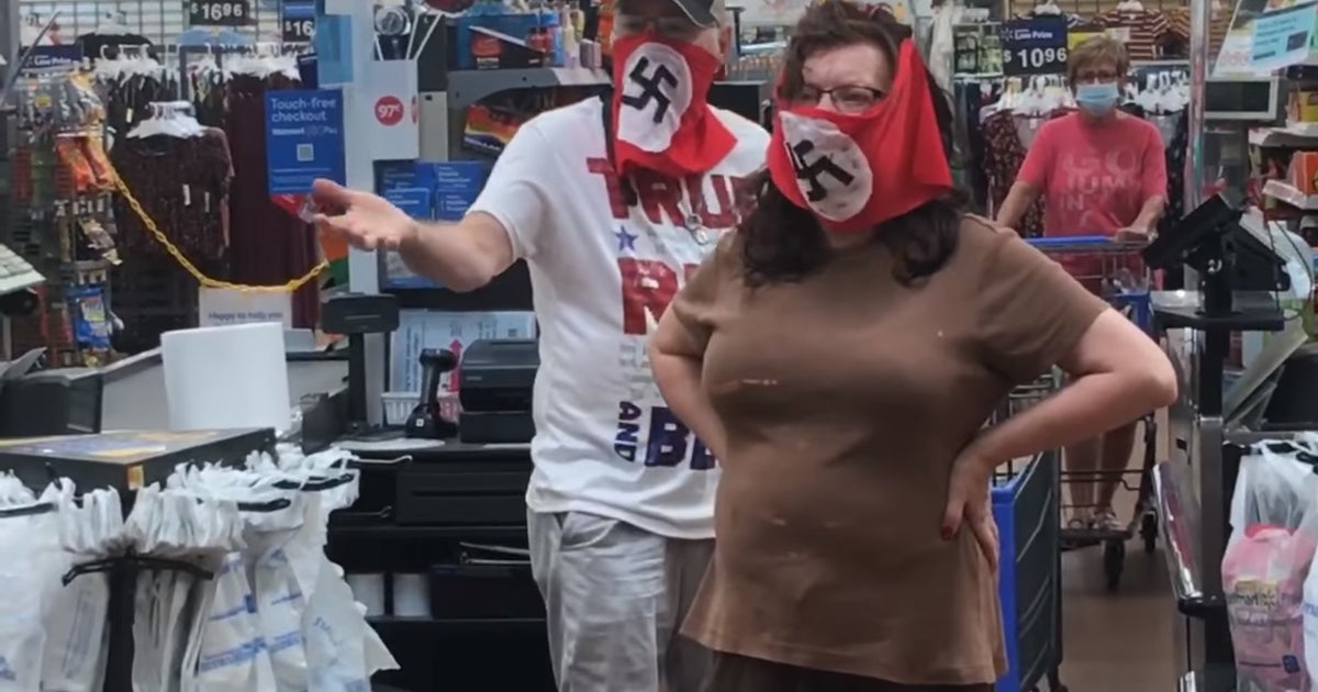 Couple banned by Walmart after wearing Nazi flag face masks at Marshall ...