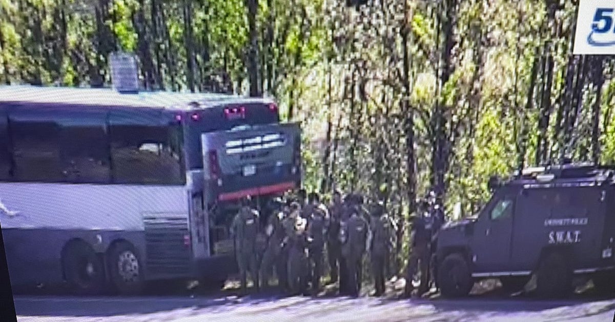SWAT standoff with armed man on Greyhound bus that caused I-85 shut ...