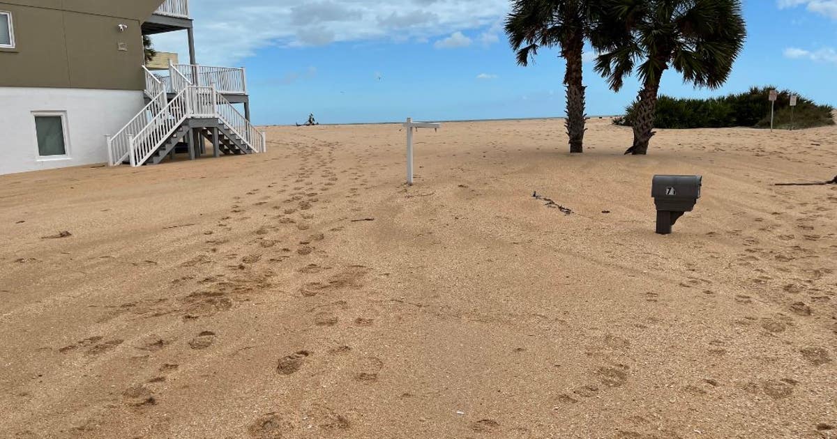 Florida beachside homes nearly buried in feet of sand after Hurricane ...