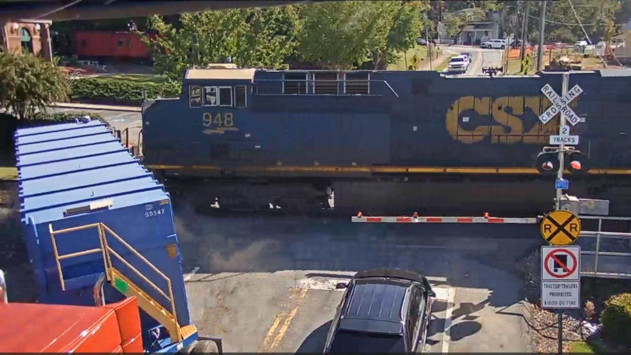 Train crashes into tractor-trailer in downtown Kennesaw, road temporarily closed | FOX 5 Atlanta