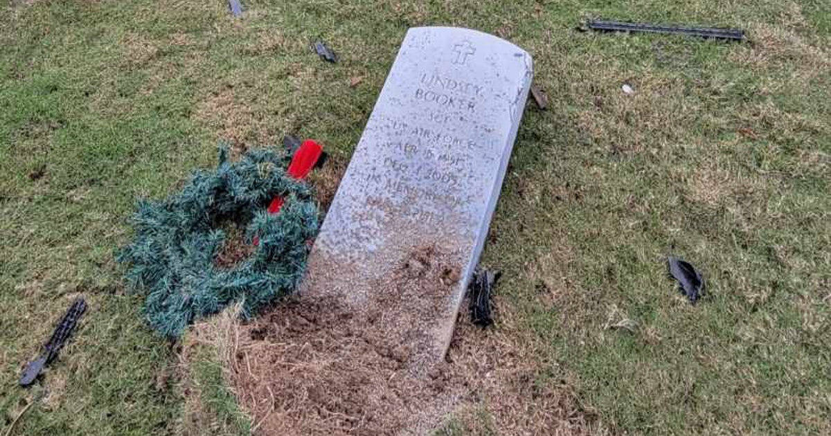 Truck driver plows through national cemetery, damaging veterans ...