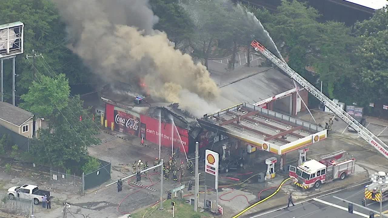 Motorcycle fire spreads to gas station on Northside Drive NW near I-75 ...