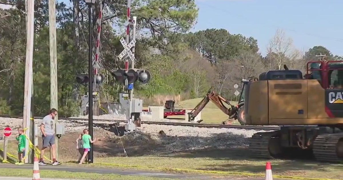 Tyrone train derailment may have been caused by loose, missing rail ...