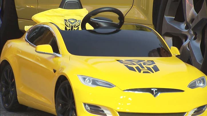 Yellow 'Transformers' cars line the street to surprise 4-year-old ...