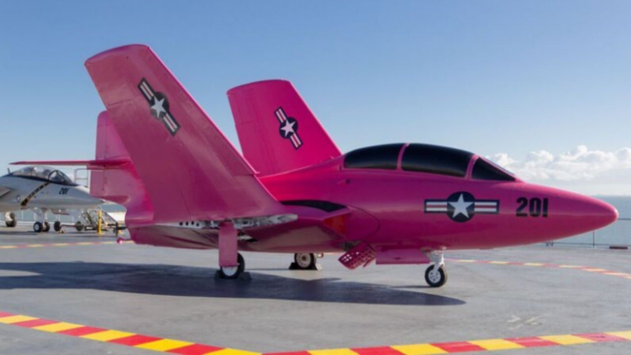 Museum unveils first-ever pink fighter jet for breast cancer awareness