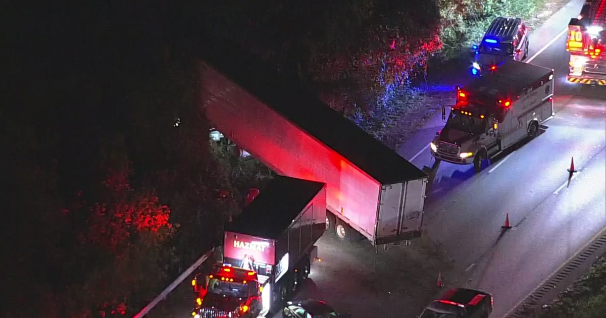 Tractor-trailer crash scatters debris on roadway slowing Monday morning ...