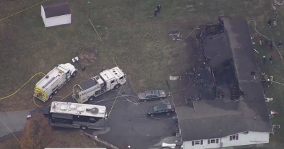 Three victims in Maryland house fire were shot before blaze, per ...