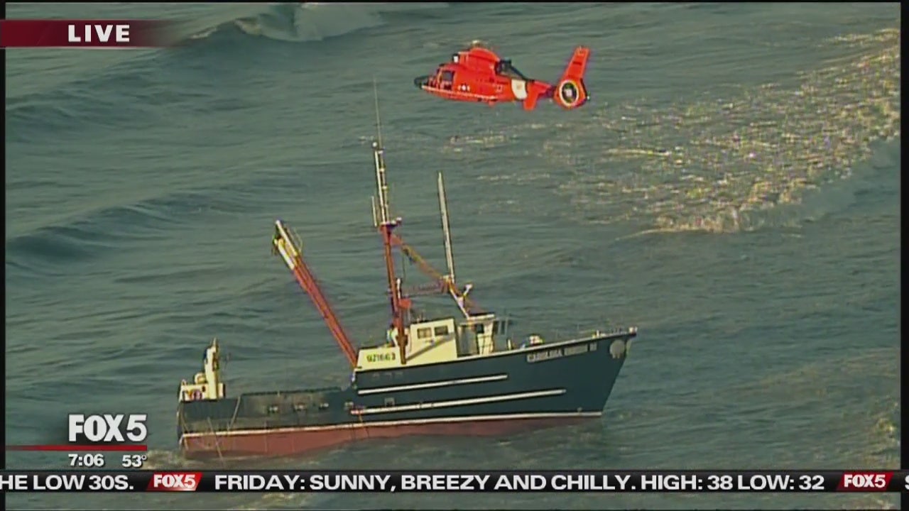 PHOTOS: Coast Guard boat capsizes rescuing fishing boat