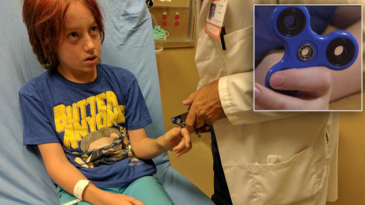 11-year-old hospitalized after fidget spinner gets stuck on finger ...