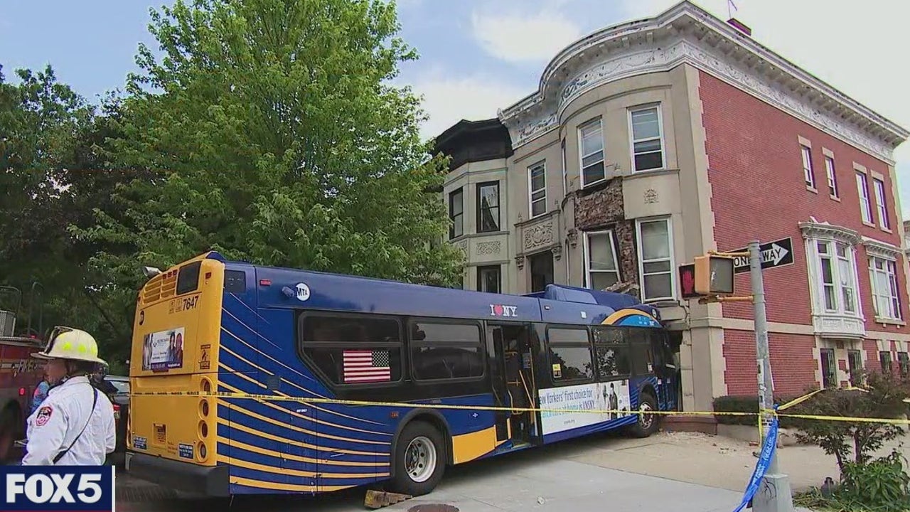 MTA bus crashes into building