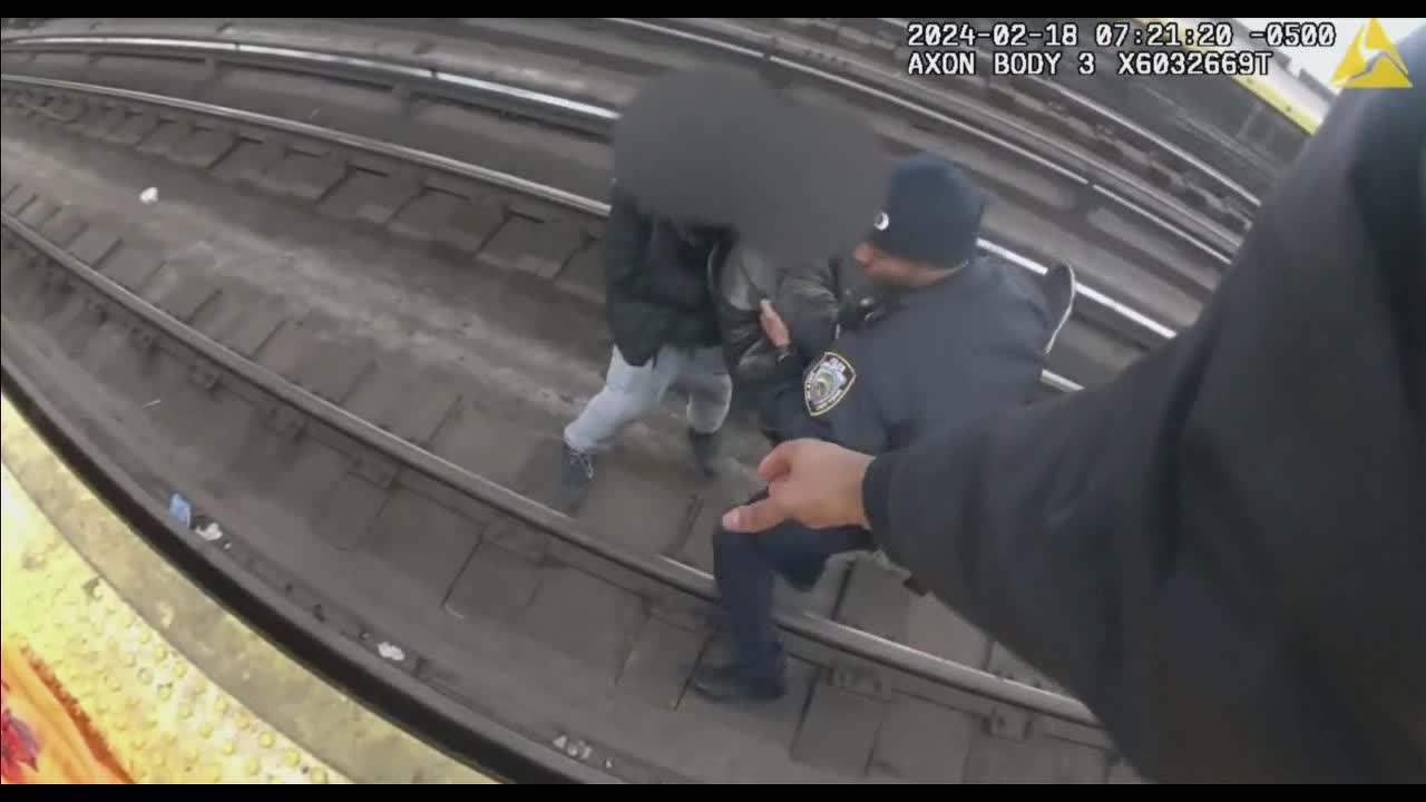 NYPD officers rescue man from subway tracks in Washington Heights ...