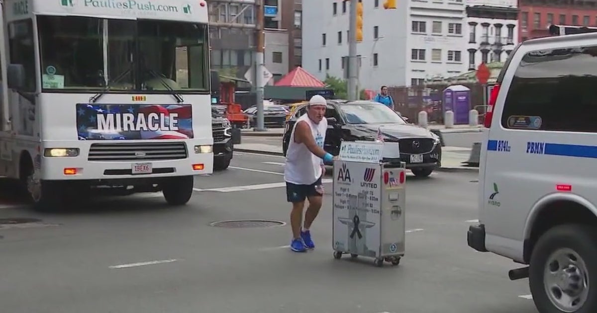 Former flight attendant honors 9/11 victims by pushing cart from Boston ...