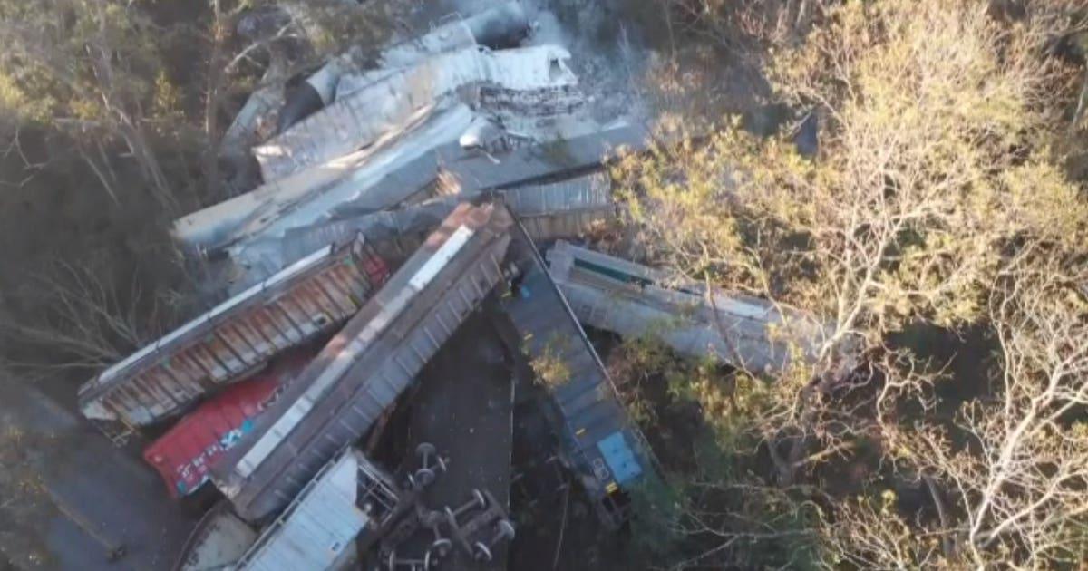 Rail cars fall off bridge onto Georgia highway | FOX6 Milwaukee