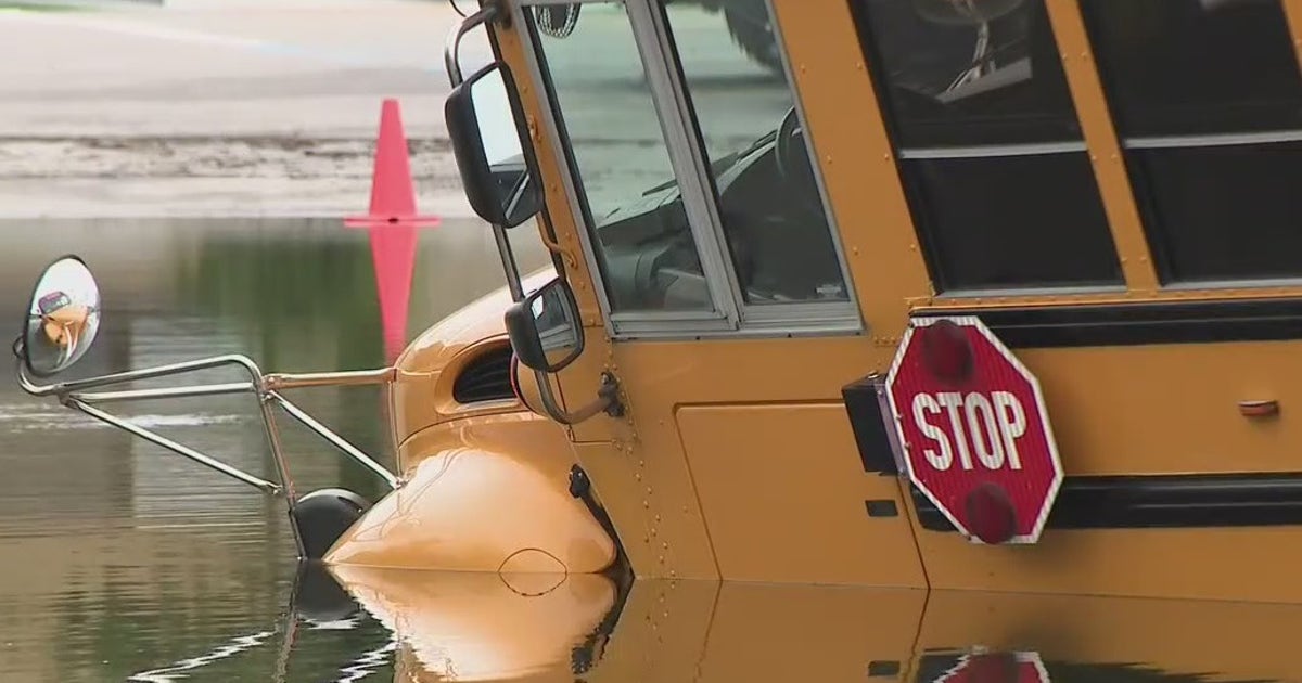 Elm Grove flooding; school bus stranded in water | FOX6 Milwaukee