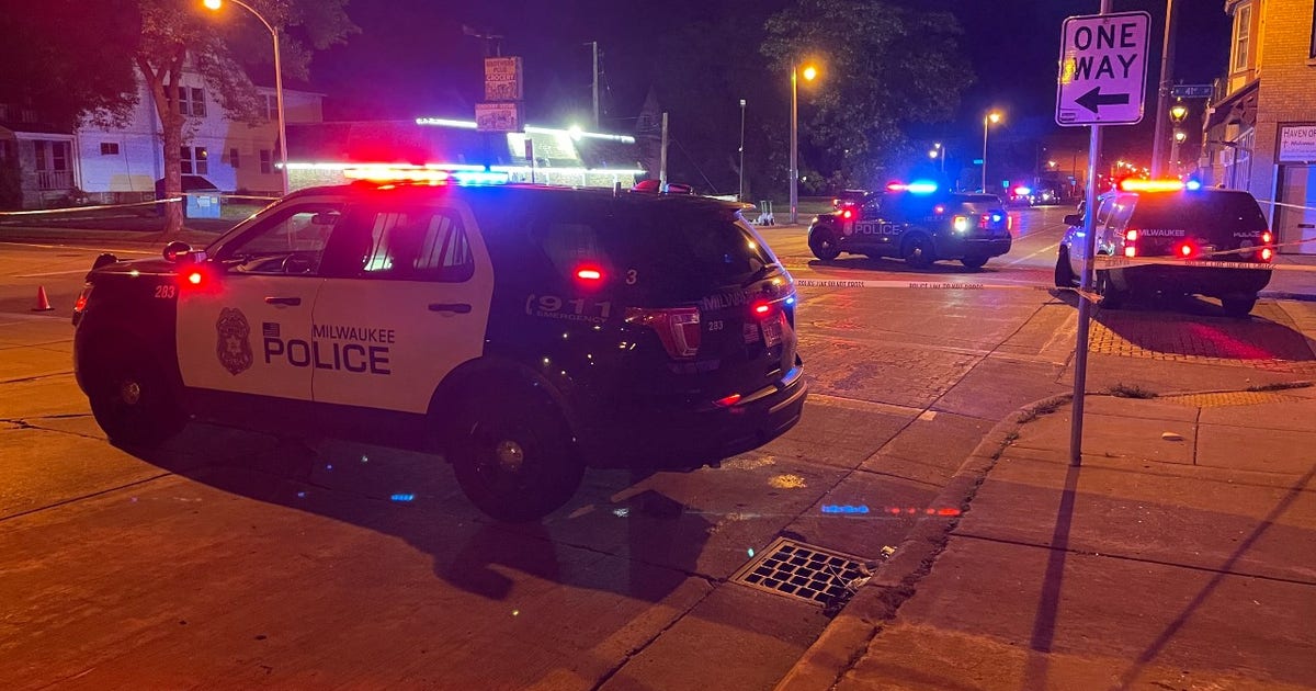 Milwaukee bar security guard shot; 22-year-old man charged, on the run ...
