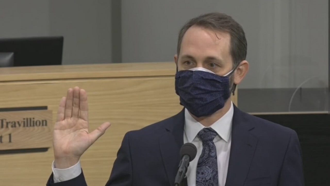 Judge Andy Brown sworn in for Travis County Commissioner's Court