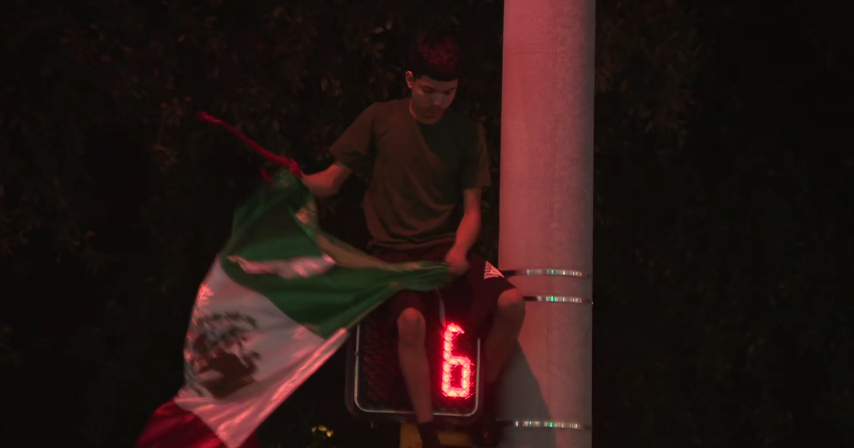 Large anti-ICE protest fills street in North Austin; 2 arrested by APD ...