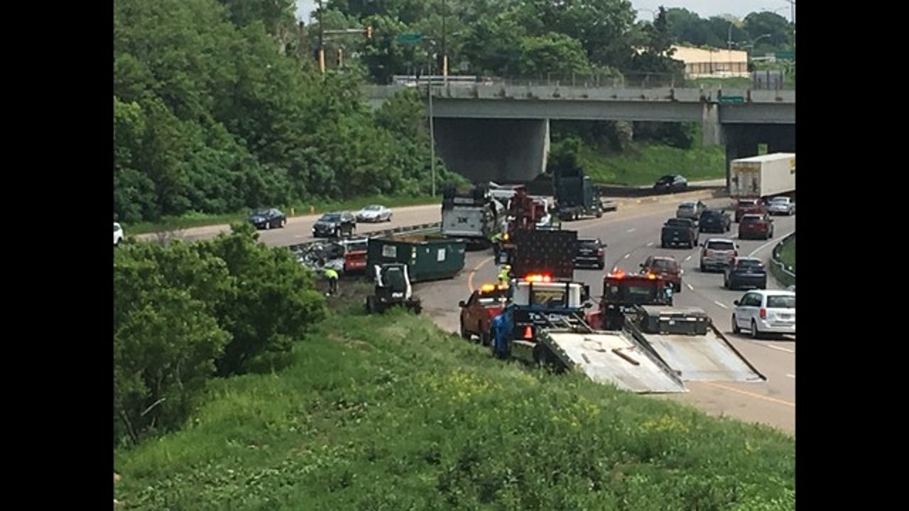Semi tips over, spills dumpster along I-94 in St. Paul