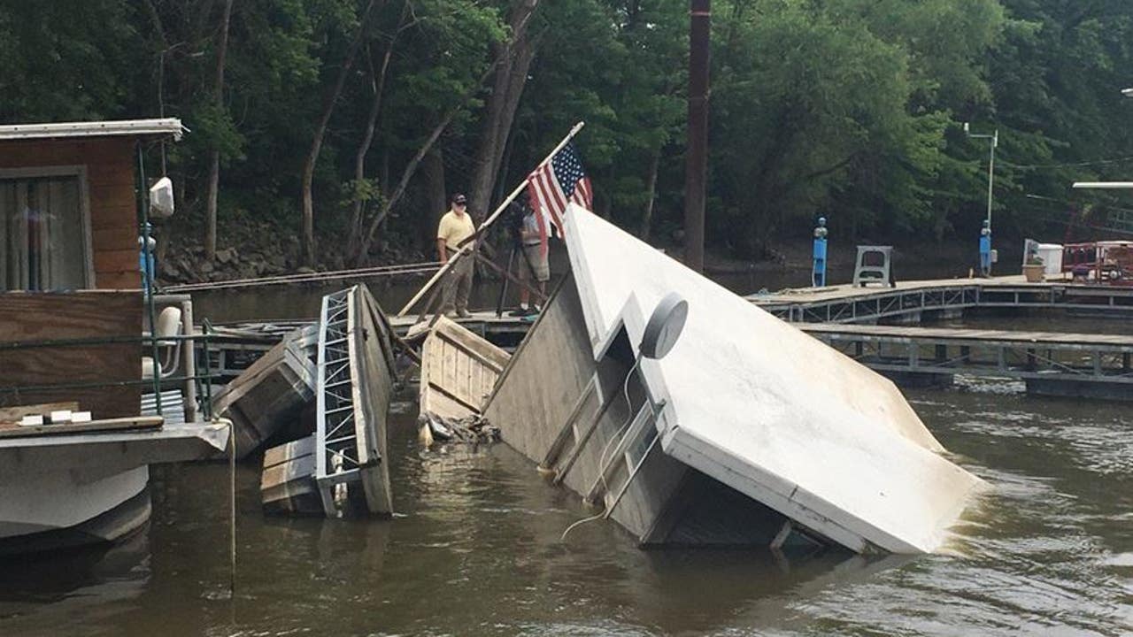 Owner, yacht club debate over removing sunken houseboat on Mississippi ...