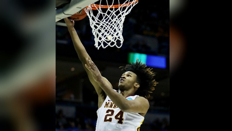 Gophers forward Eric Curry suffers season-ending injury Gophers forward Eric Curry suffers season-ending injury