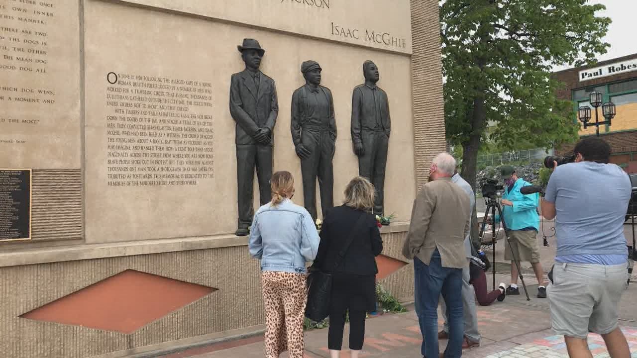 Gov. Walz tours memorial in Duluth, Minnesota to mark 100 years since ...