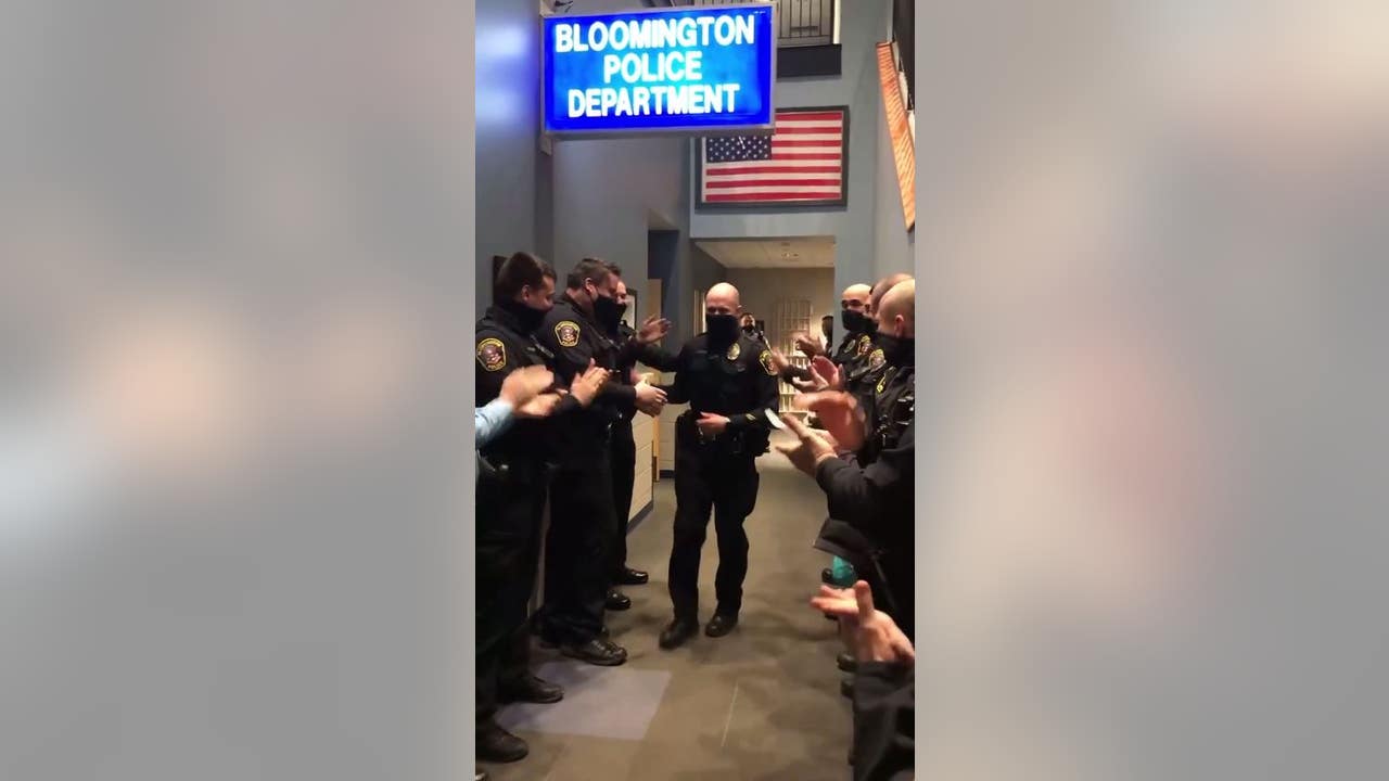 Bloomington police celebrate officer's return to patrol after leukemia ...