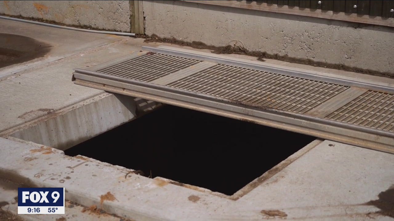 Dairy farmer rescued after falling into manure pit