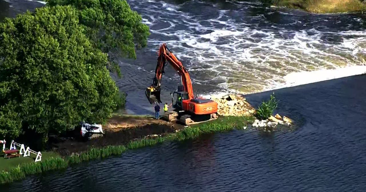 Faribault dam damaged by flooding, crews work to ease erosion | FOX 9 ...